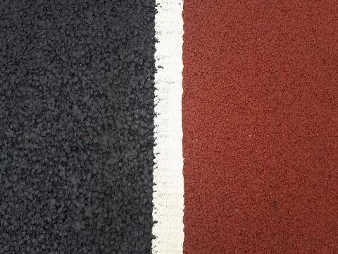 Surfacing The Town Red: Aggregate Industries supplies red asphalt to ...